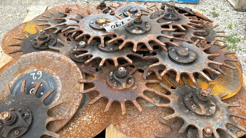 Skid of Coulters & Weeder Wheels